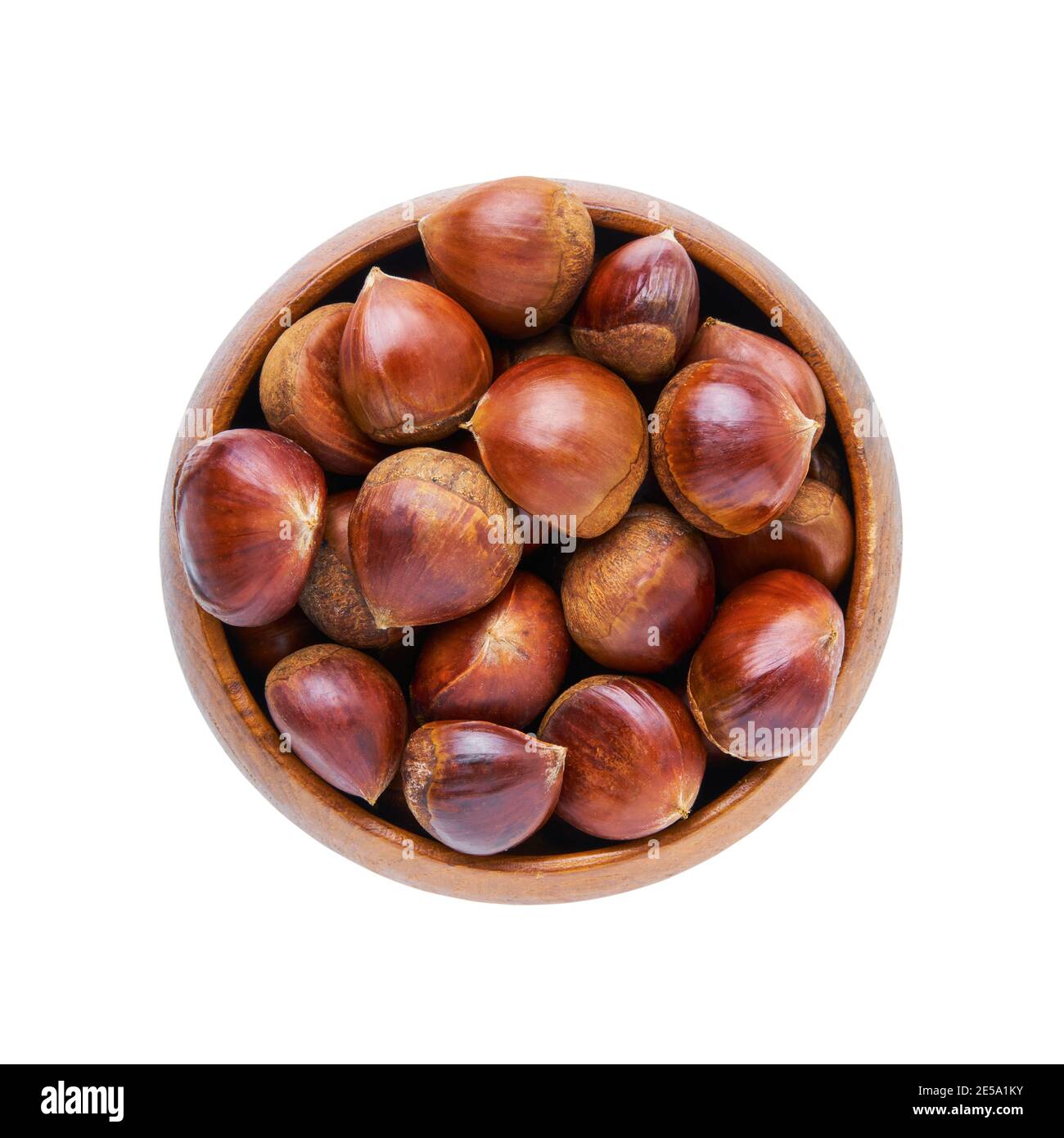 Pile of fresh chestnuts in a bamboo bowl isolated over white background ...