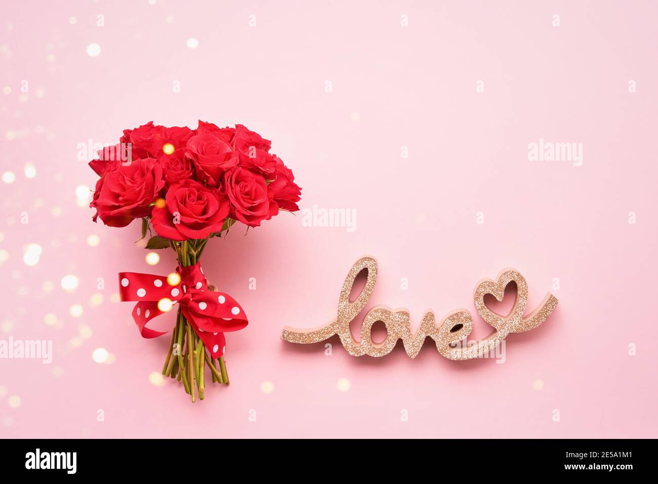 Bouquet of red roses flowers and word LOVE on a pink background. Flat ...