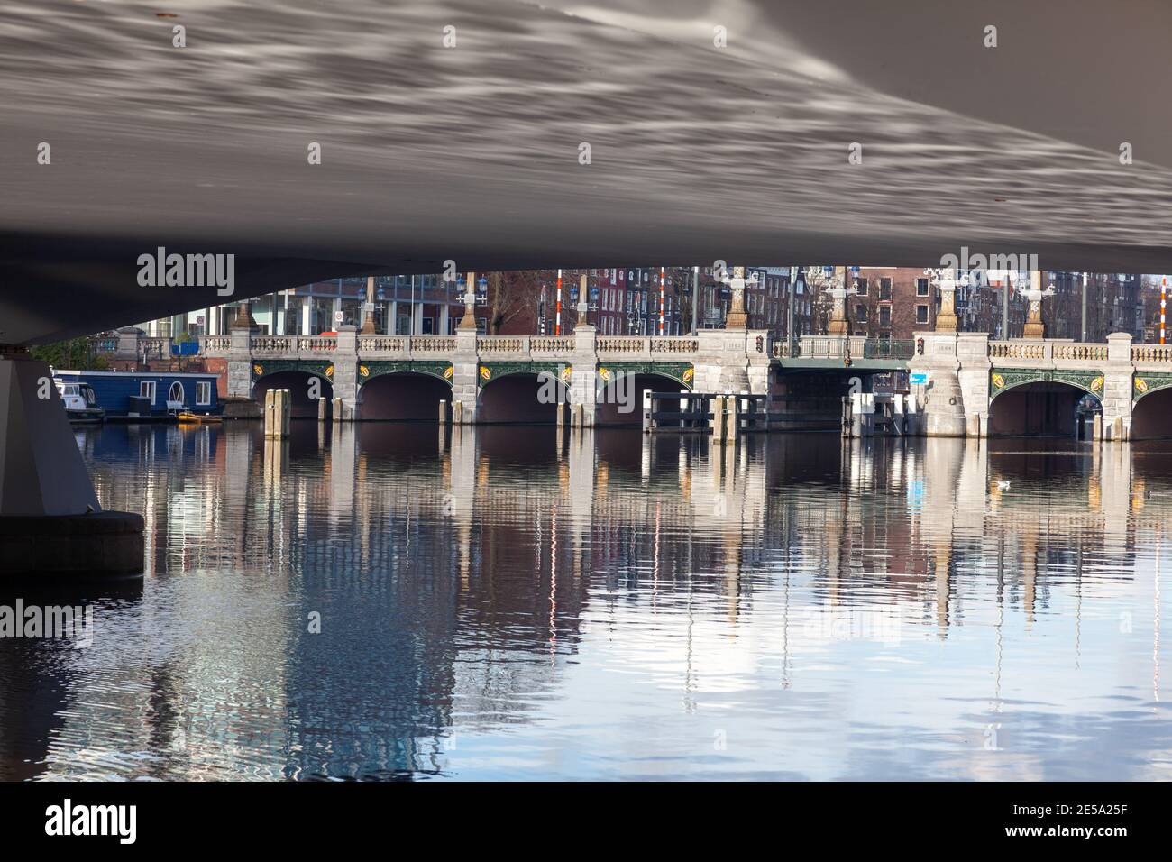 Reflections under the bridge,Amsterdam Stock Photo - Alamy