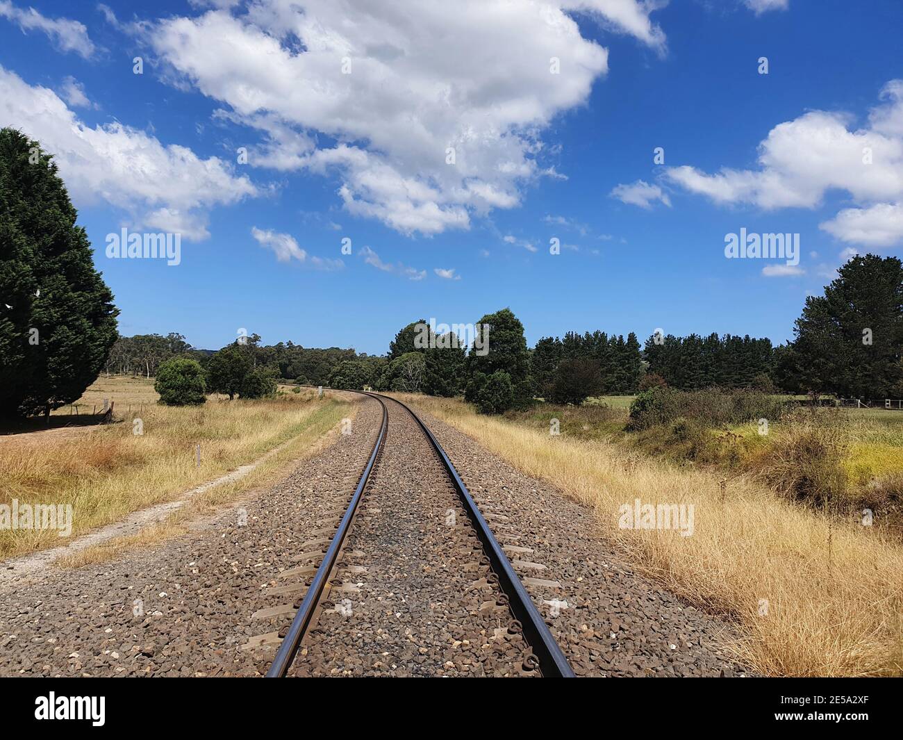 Fantastic shot of a long railroad through the forest in Australia Stock ...