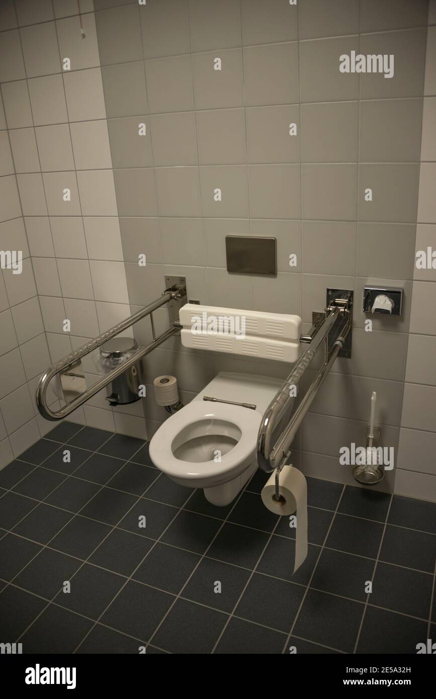 Modern toilet for disabled wheelchaired people in Germany, closeup ...