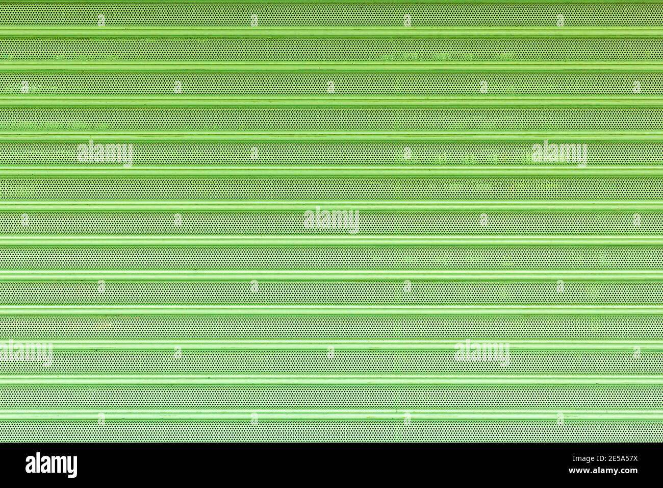 Abstract green perforated gate texture background Stock Photo - Alamy