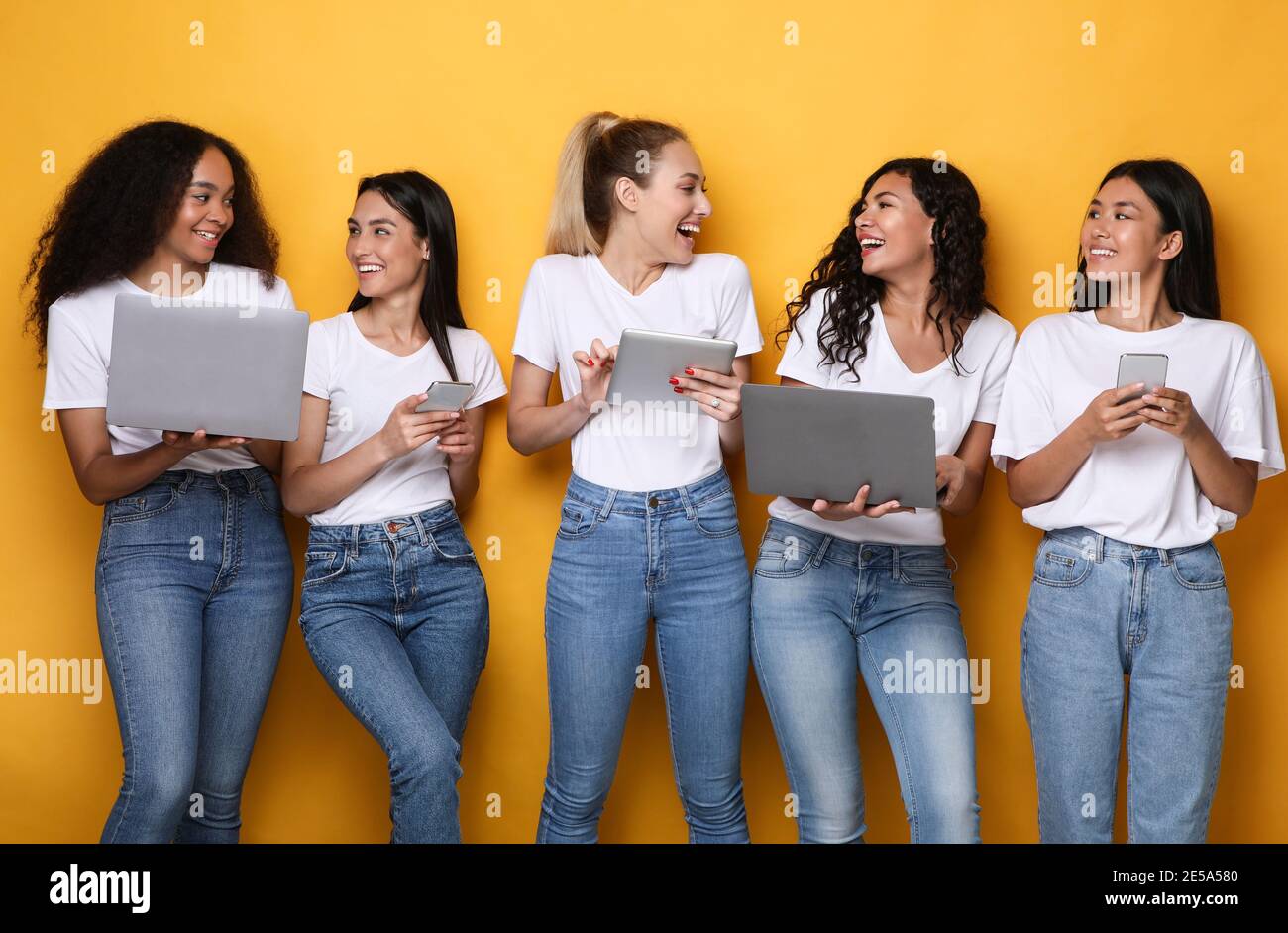 Using laptop and smartphones hi-res stock photography and images - Alamy