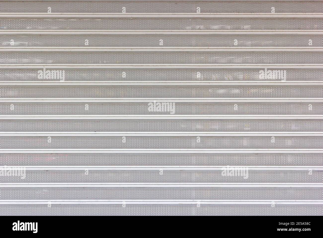 Abstract gray perforated gate texture background Stock Photo - Alamy