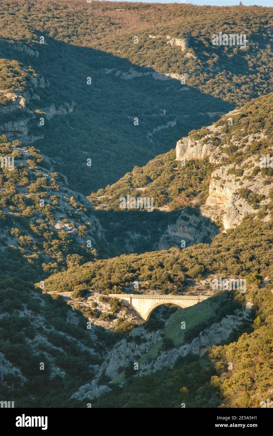 Bridge in a valley Stock Photo - Alamy