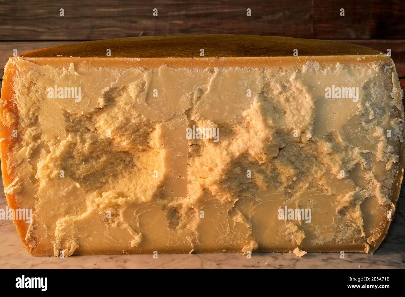 Italian parmesan cheese, half form di grana cheese section cut with ...