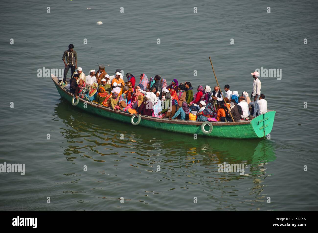 Boat of pilgrims on the Ganges River, Ghats, Varanasi, India Stock ...