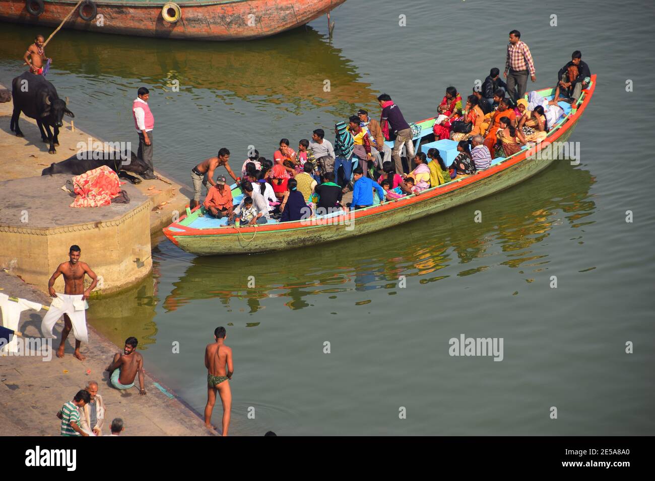 Boat of pilgrims on the Ganges River, Ghats, Varanasi, India Stock ...