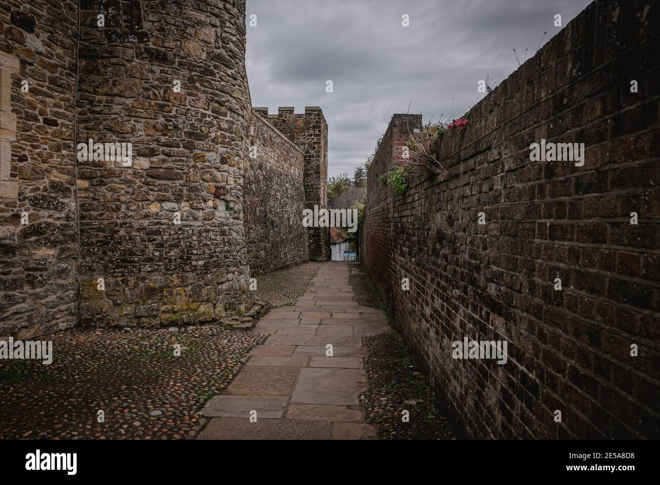 Narrow brick corridor hi-res stock photography and images - Alamy