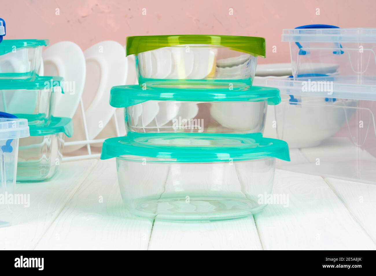 Clean kitchen with various plates and food boxes Stock Photo - Alamy