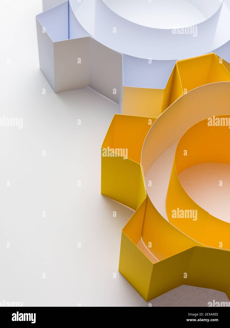 Paper gears concept on white background Stock Photo - Alamy