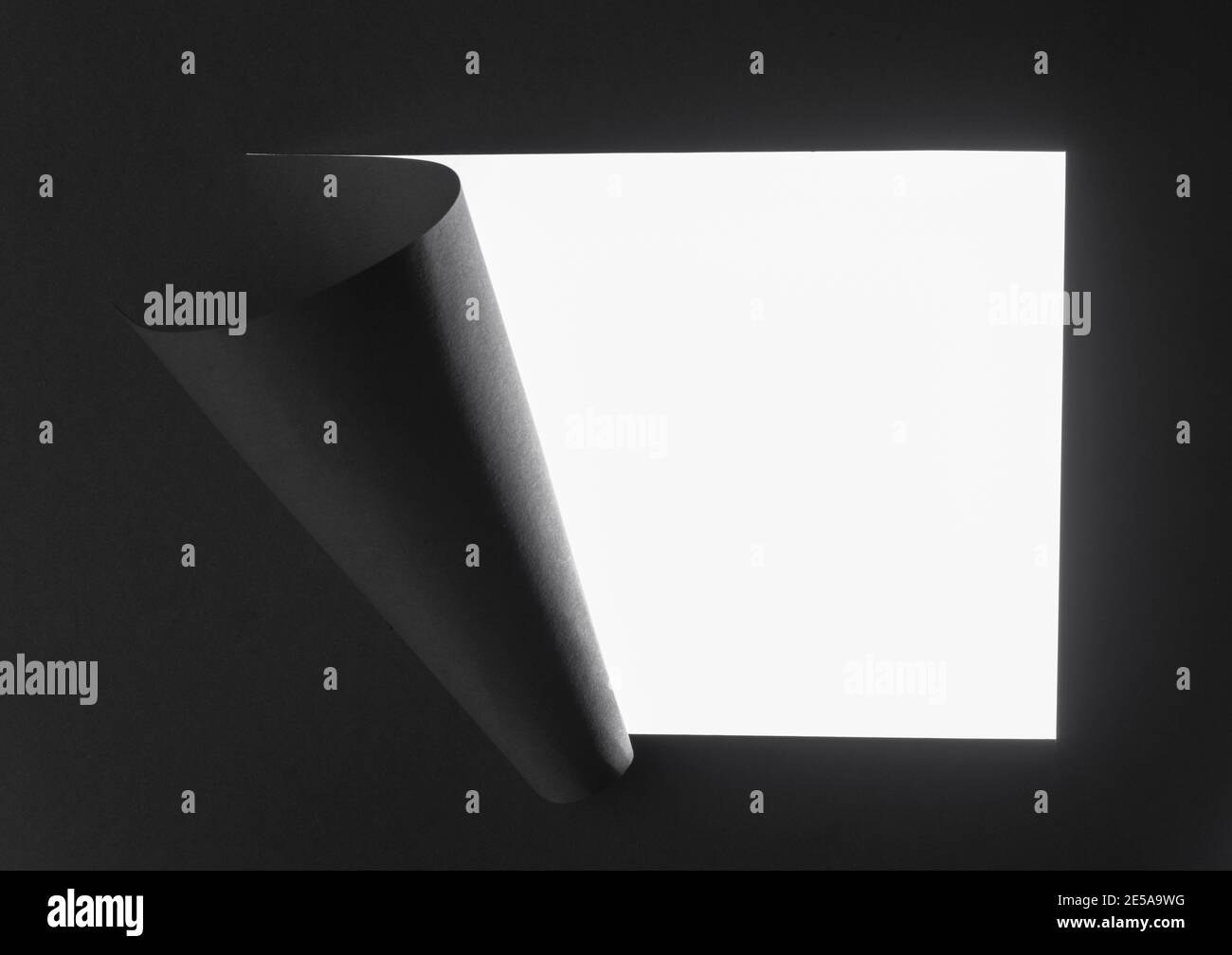 Breakthrough paper hole on isolated white background Stock Photo - Alamy