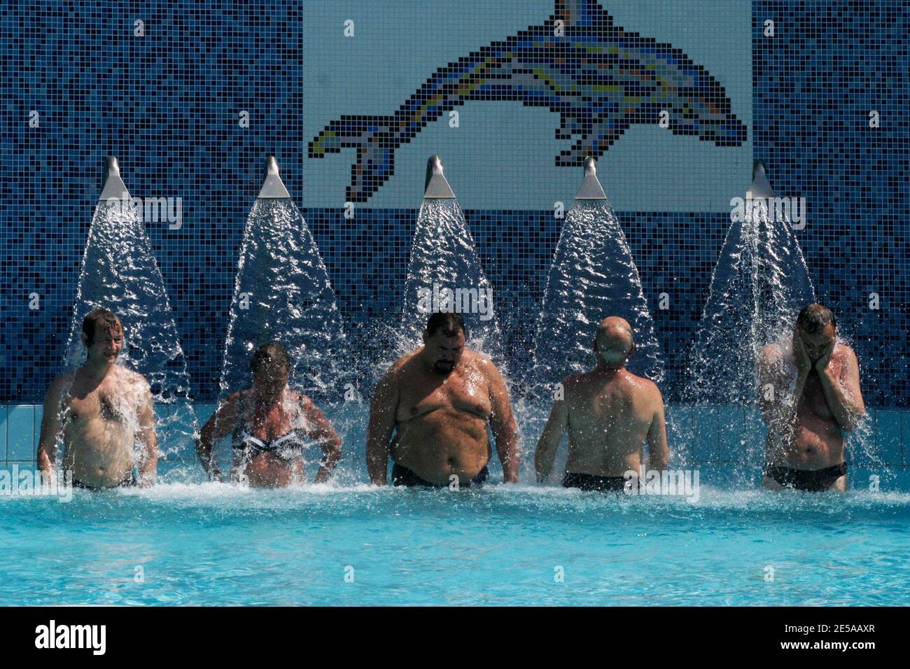 People enjoying a relaxing hydro-massage at a private pool Stock Photo ...