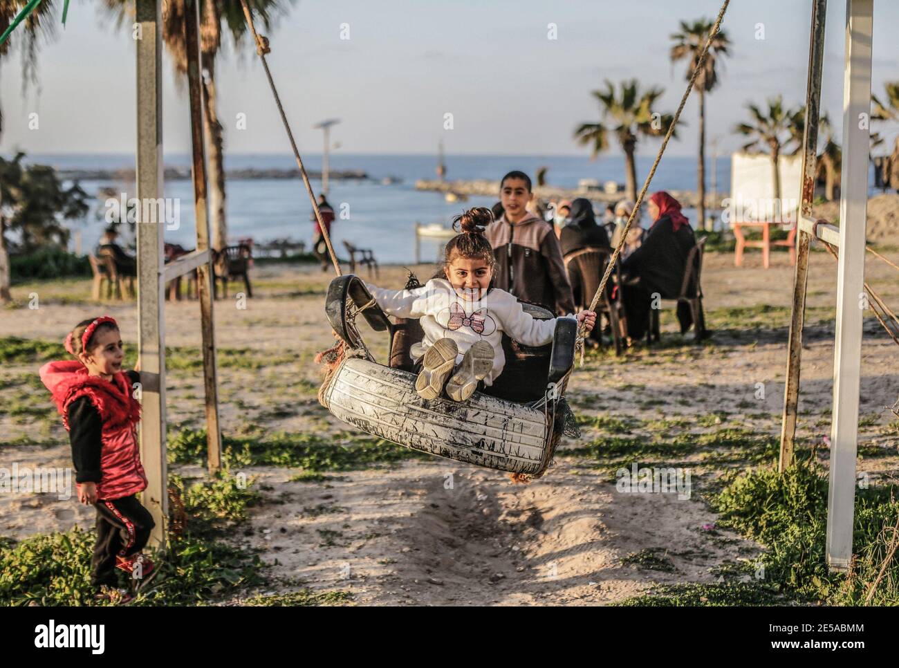 Gaza, Palestine. 25th Jan, 2021. Palestinian children play along the ...