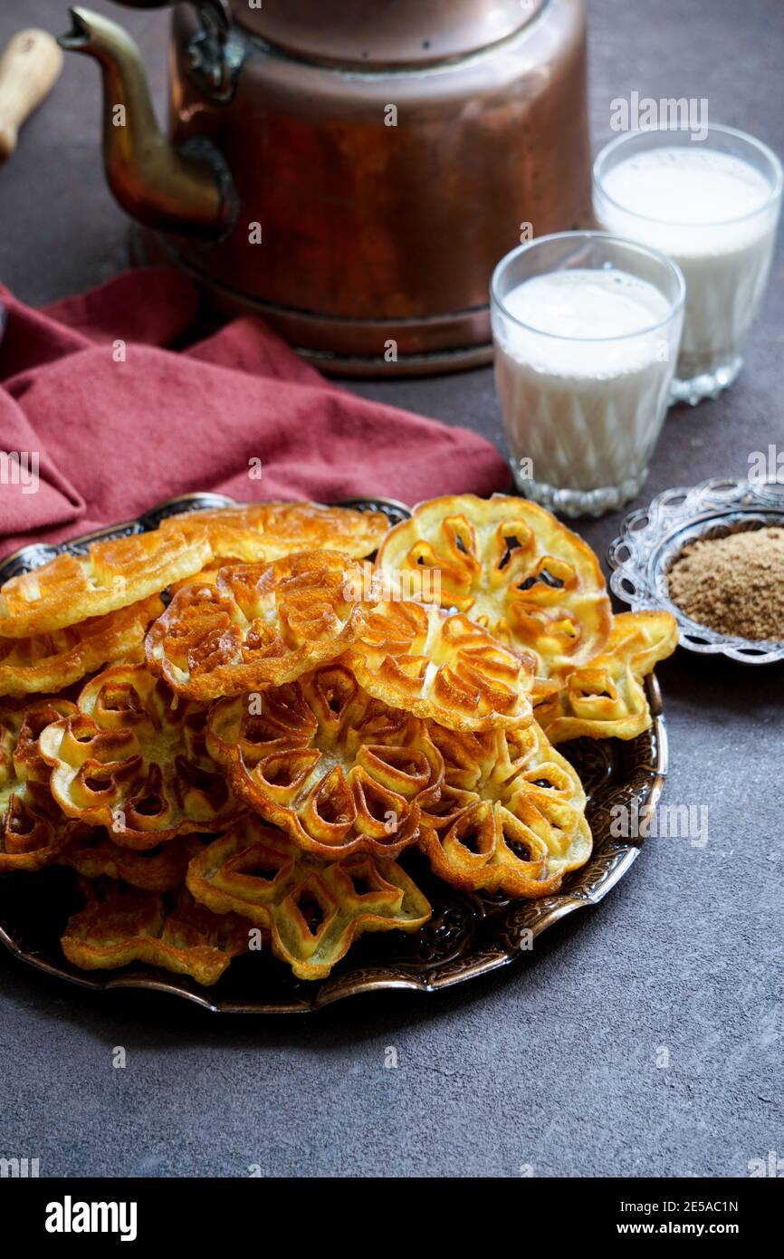 Indian rose cookies, achappam, Achu Murukku indian christmas food Stock ...
