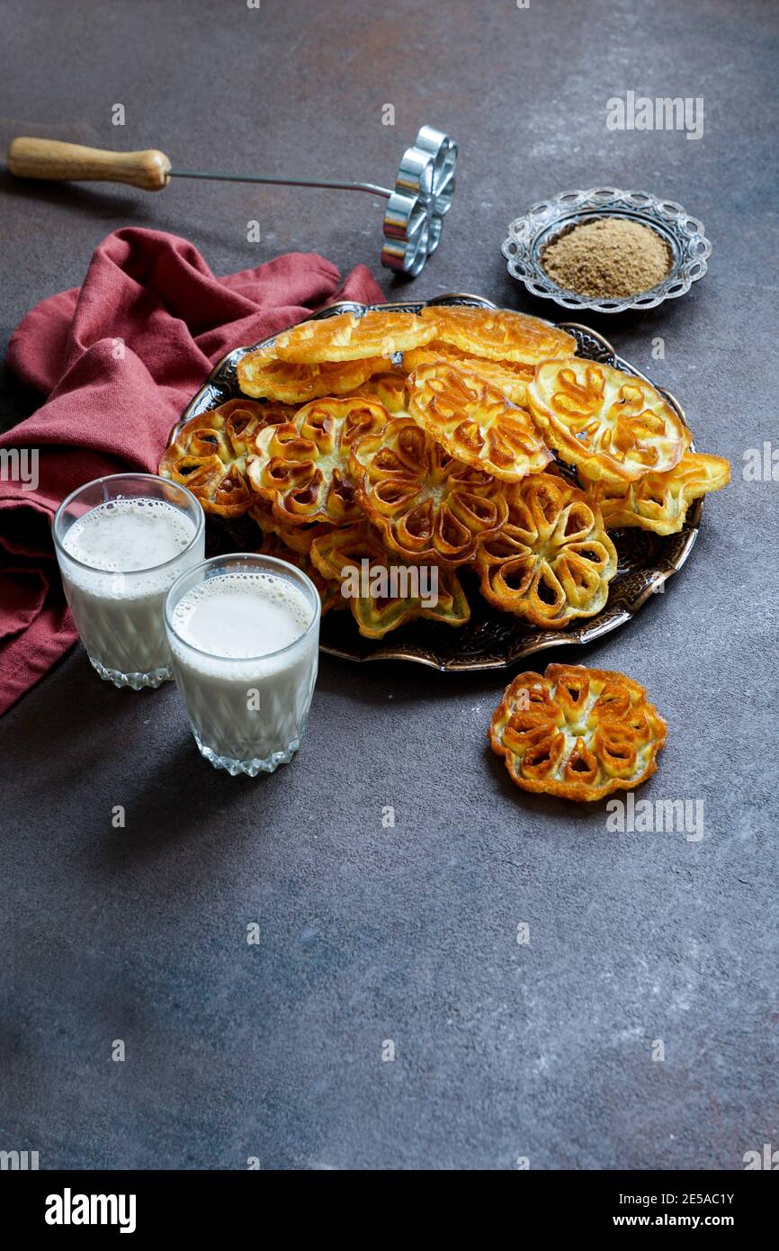 Indian rose cookies, achappam, Achu Murukku indian christmas food Stock ...