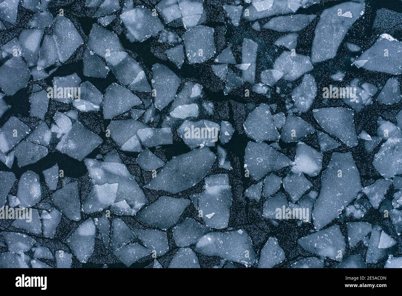 Top down view of ice chunks on sea Stock Photo - Alamy