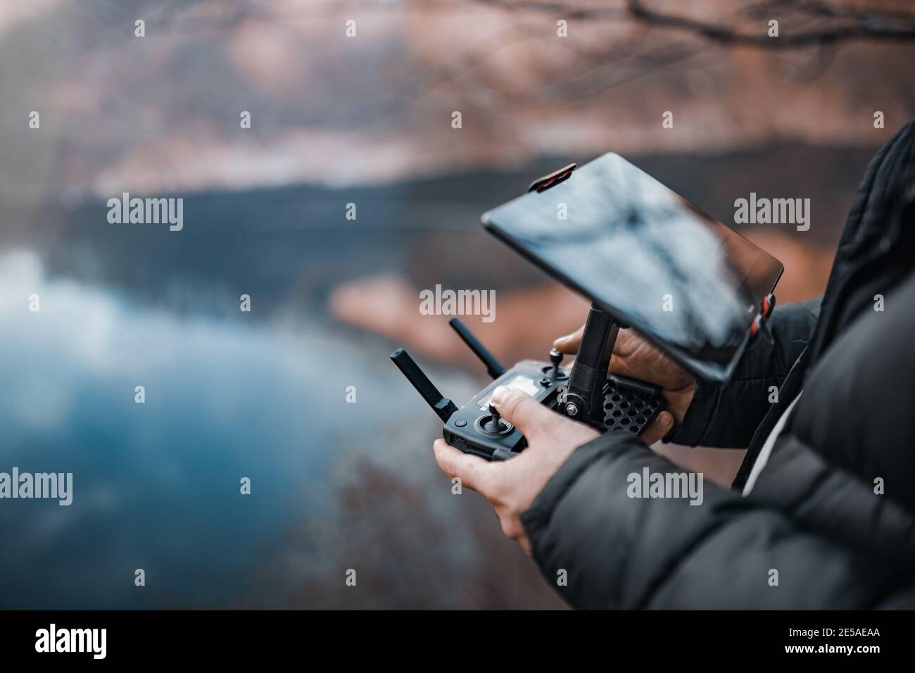 Man holding controller piloting drone hi-res stock photography and ...