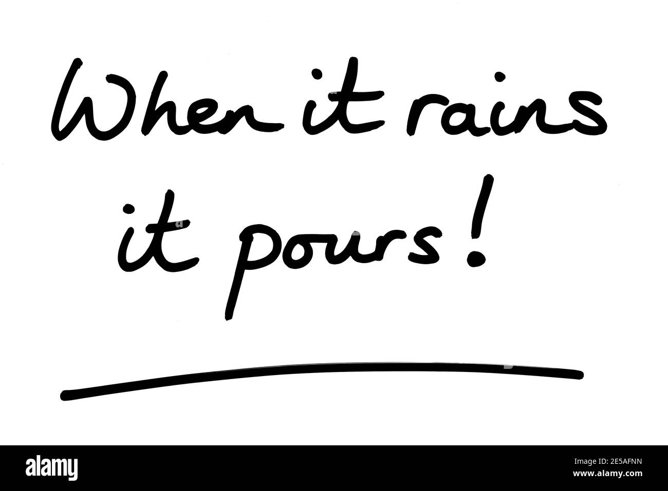 When it rains it pours! handwritten on a white background Stock Photo ...