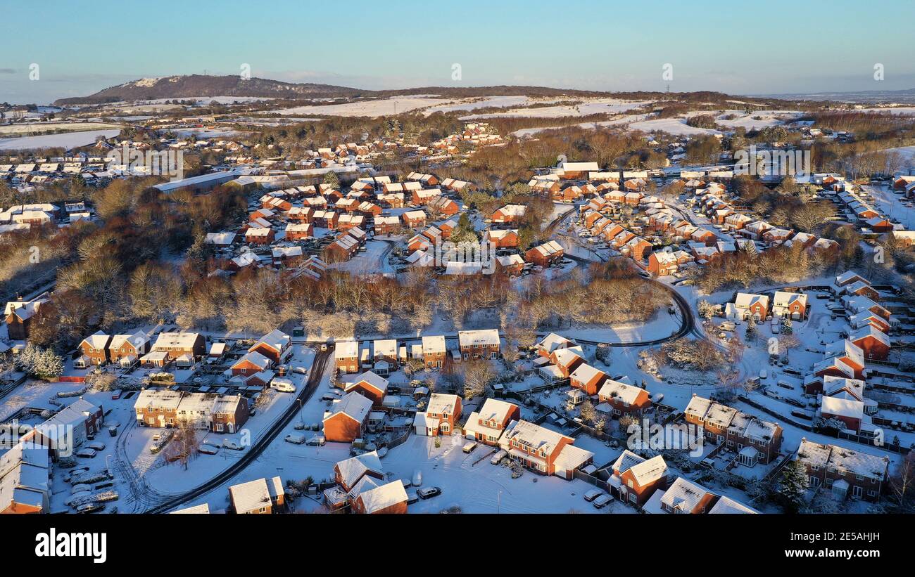 Aerial view modern housing estate with houses covered in snow at Lawley ...