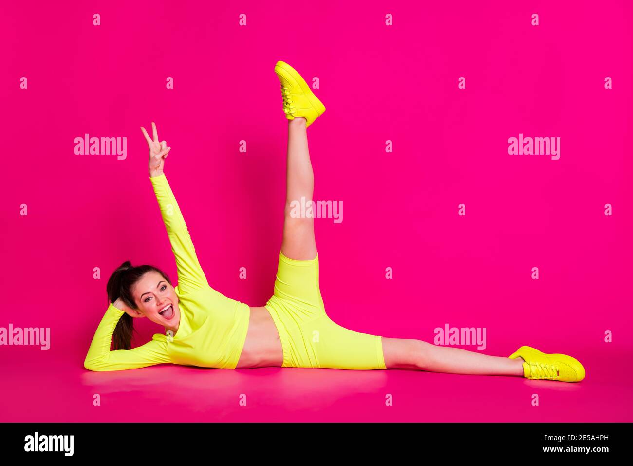 Full length body size photo of girl doing stretching on floor showing v ...