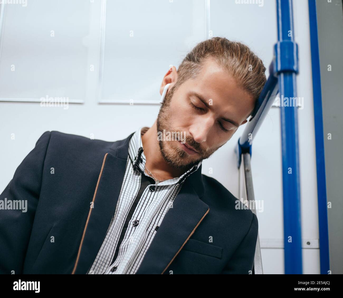 Person sleeping inside train hi-res stock photography and images - Alamy