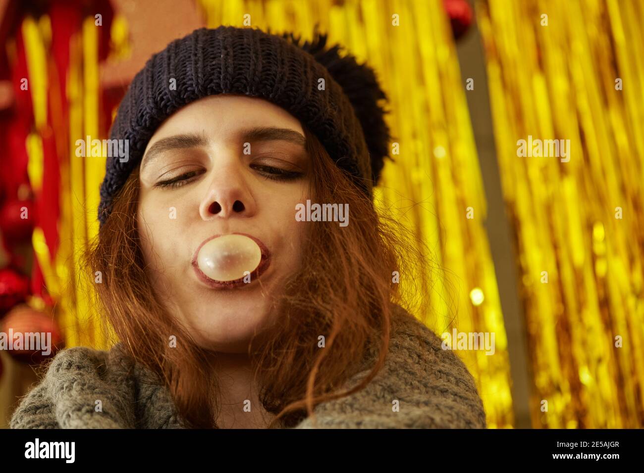 portrait of a young woman with a chewing gum in the night city Stock ...