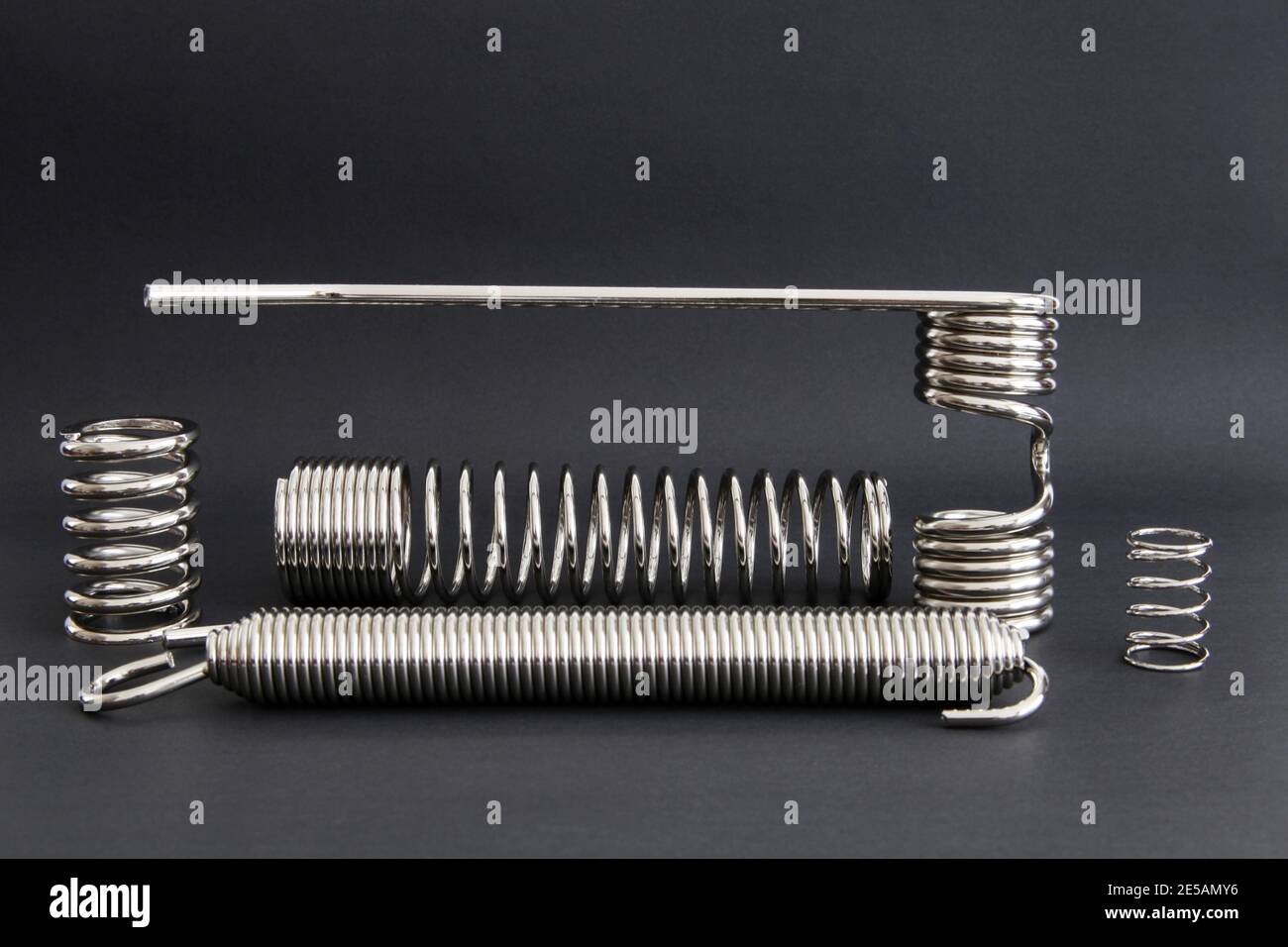 Metal springs in different sizes Stock Photo - Alamy