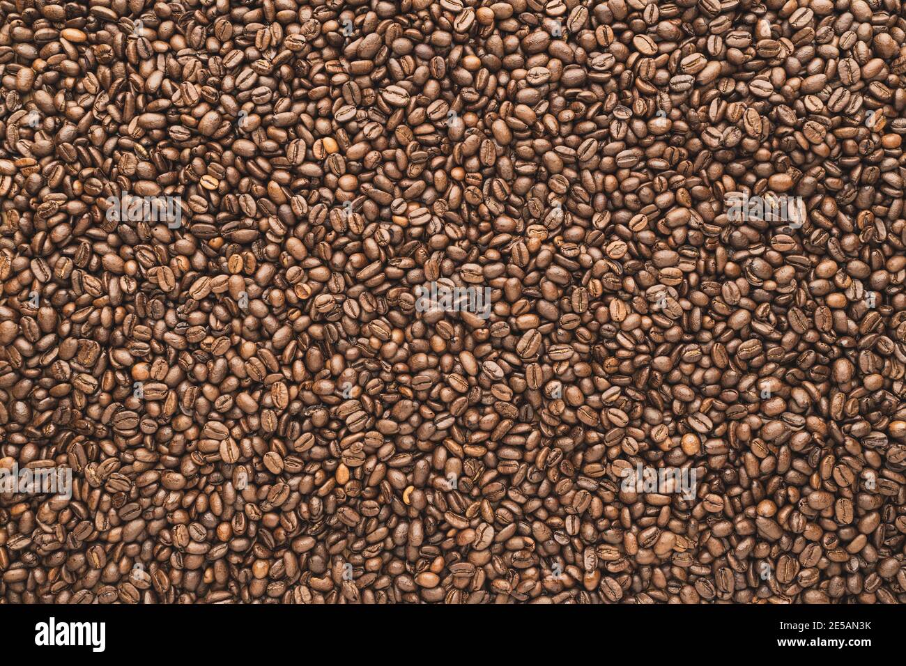 A texture made of roasted coffee beans. A great background and pattern ...