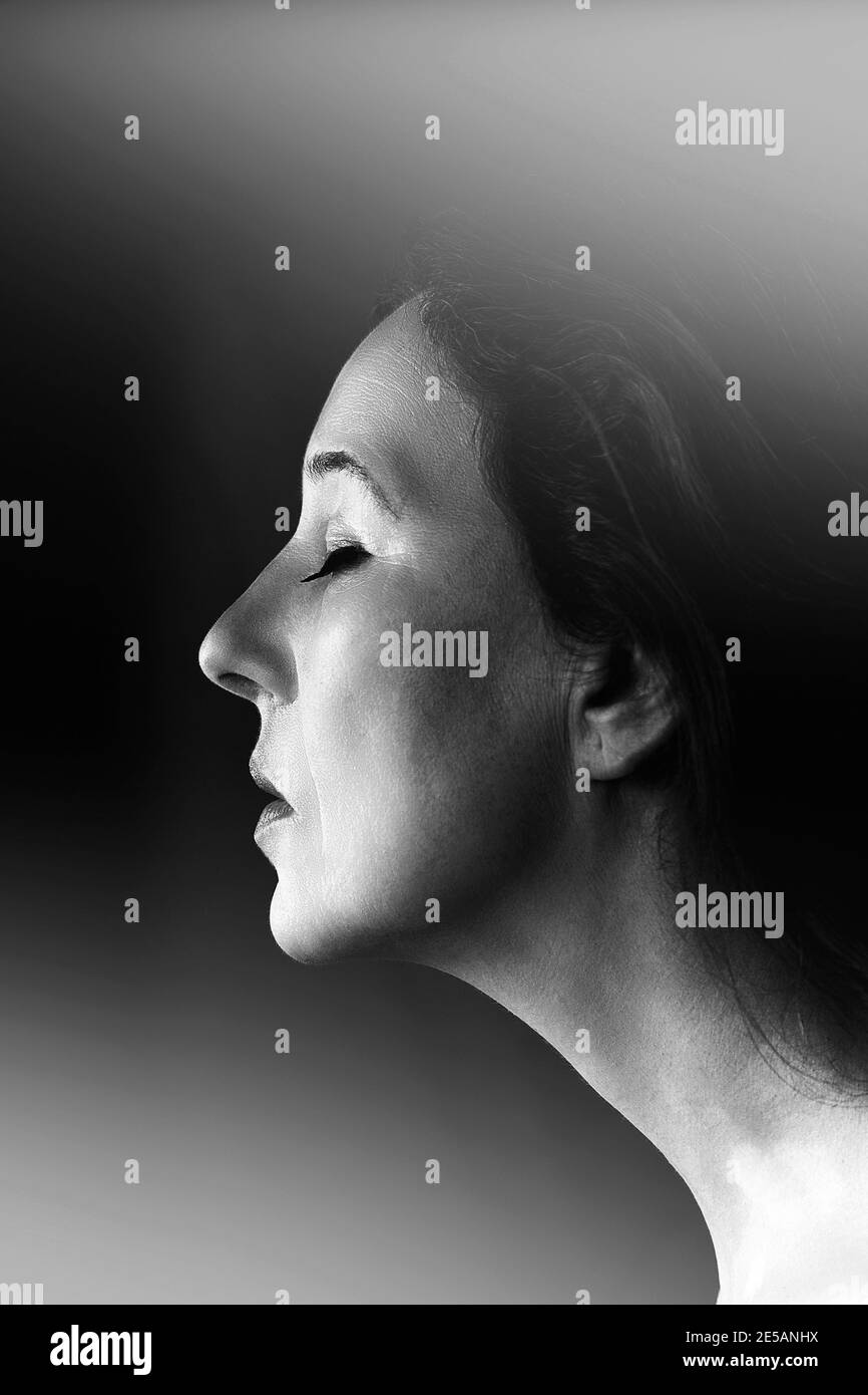 Woman face shadow profile hi-res stock photography and images - Alamy