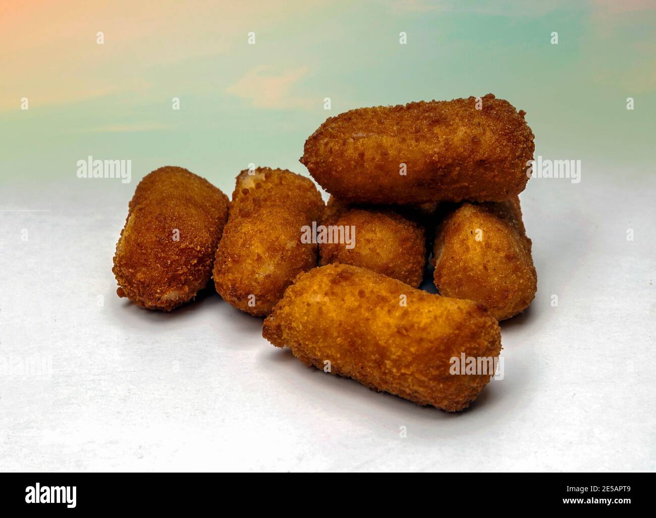 Croquettes surrounded by white background Stock Photo - Alamy