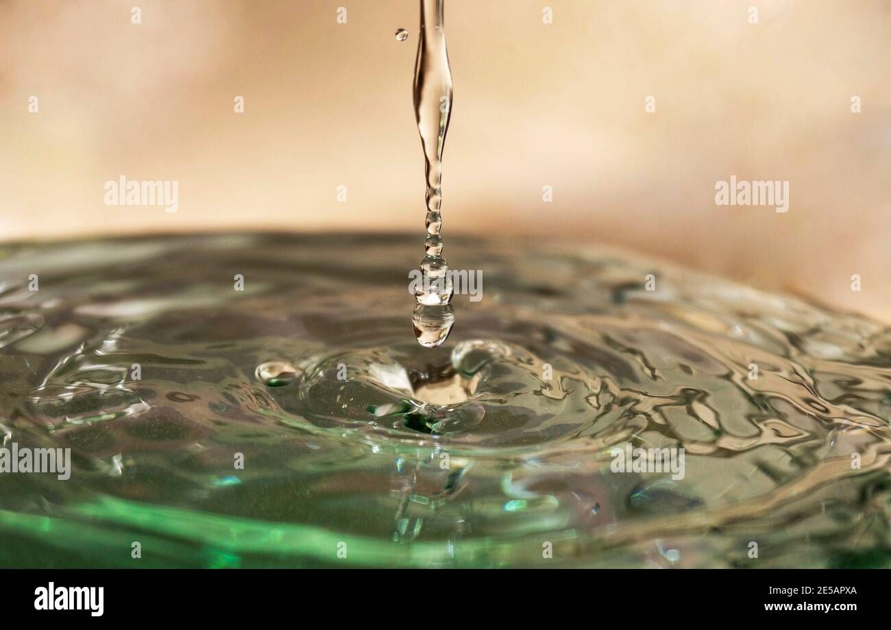 Blue and green water drop hi-res stock photography and images - Alamy