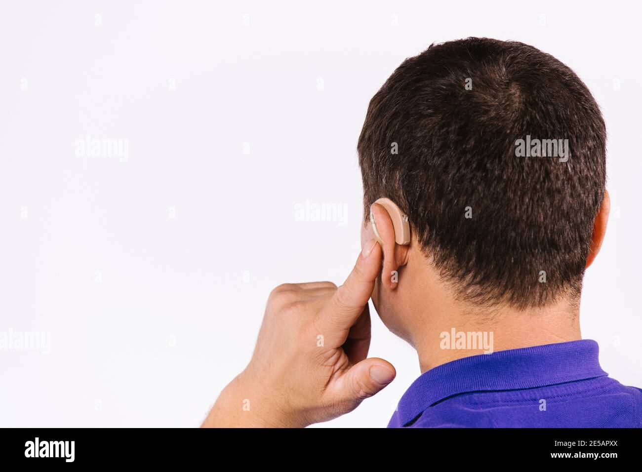 Photo from behind. An enlarged photo. Back of the head of a man ...