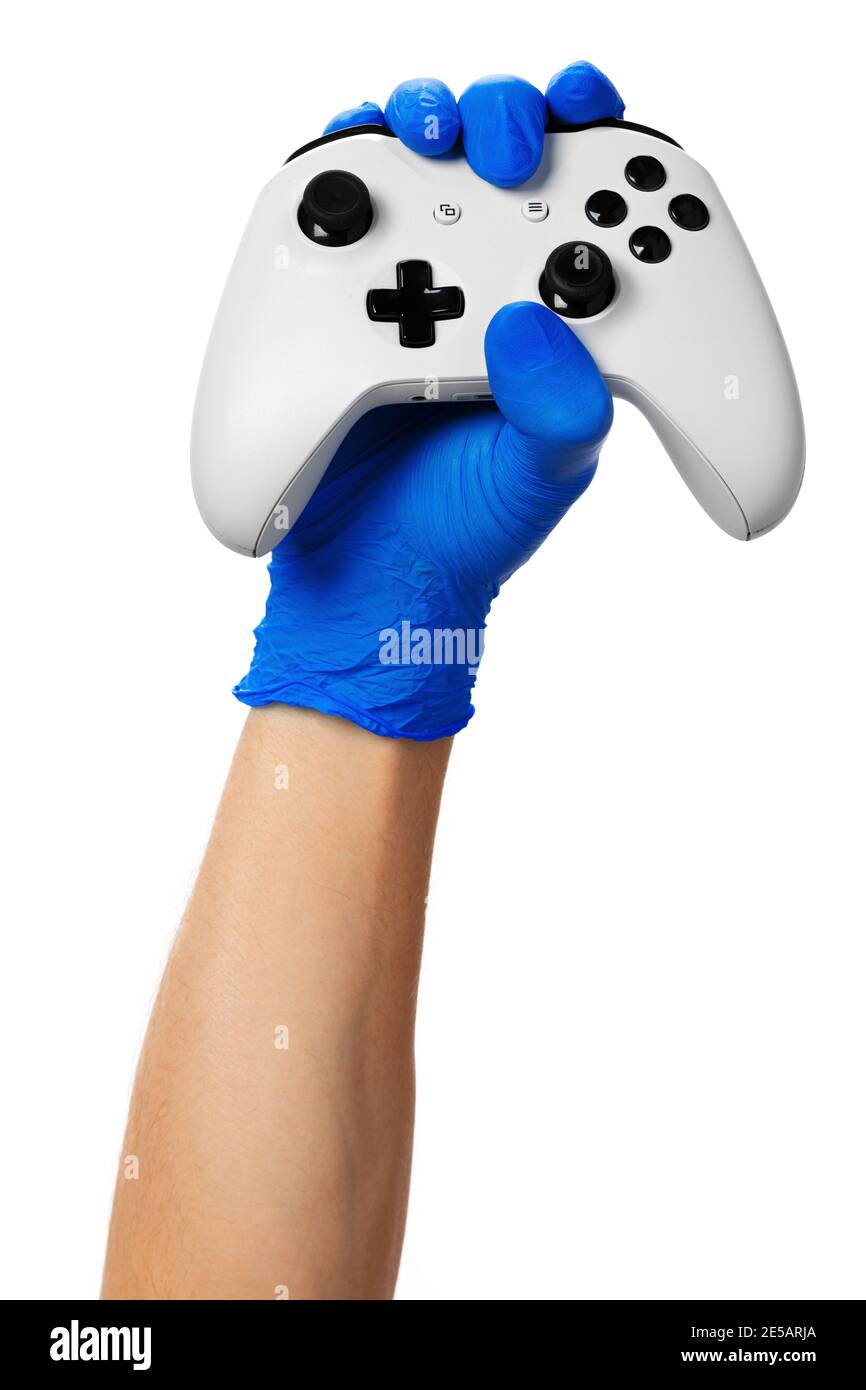 Hand holding games controller Cut Out Stock Images & Pictures - Alamy