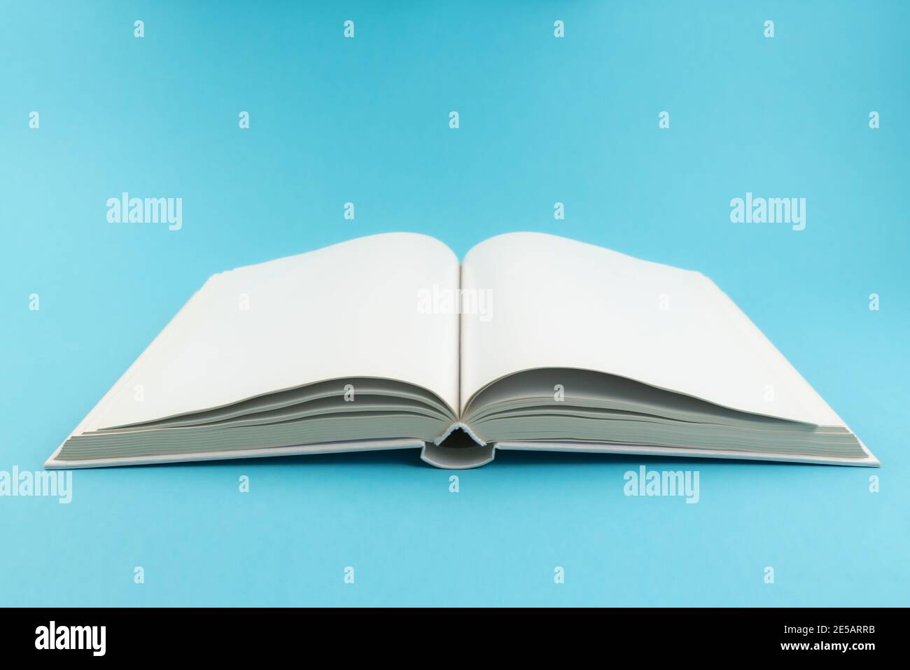 Open book blue background hi-res stock photography and images - Alamy