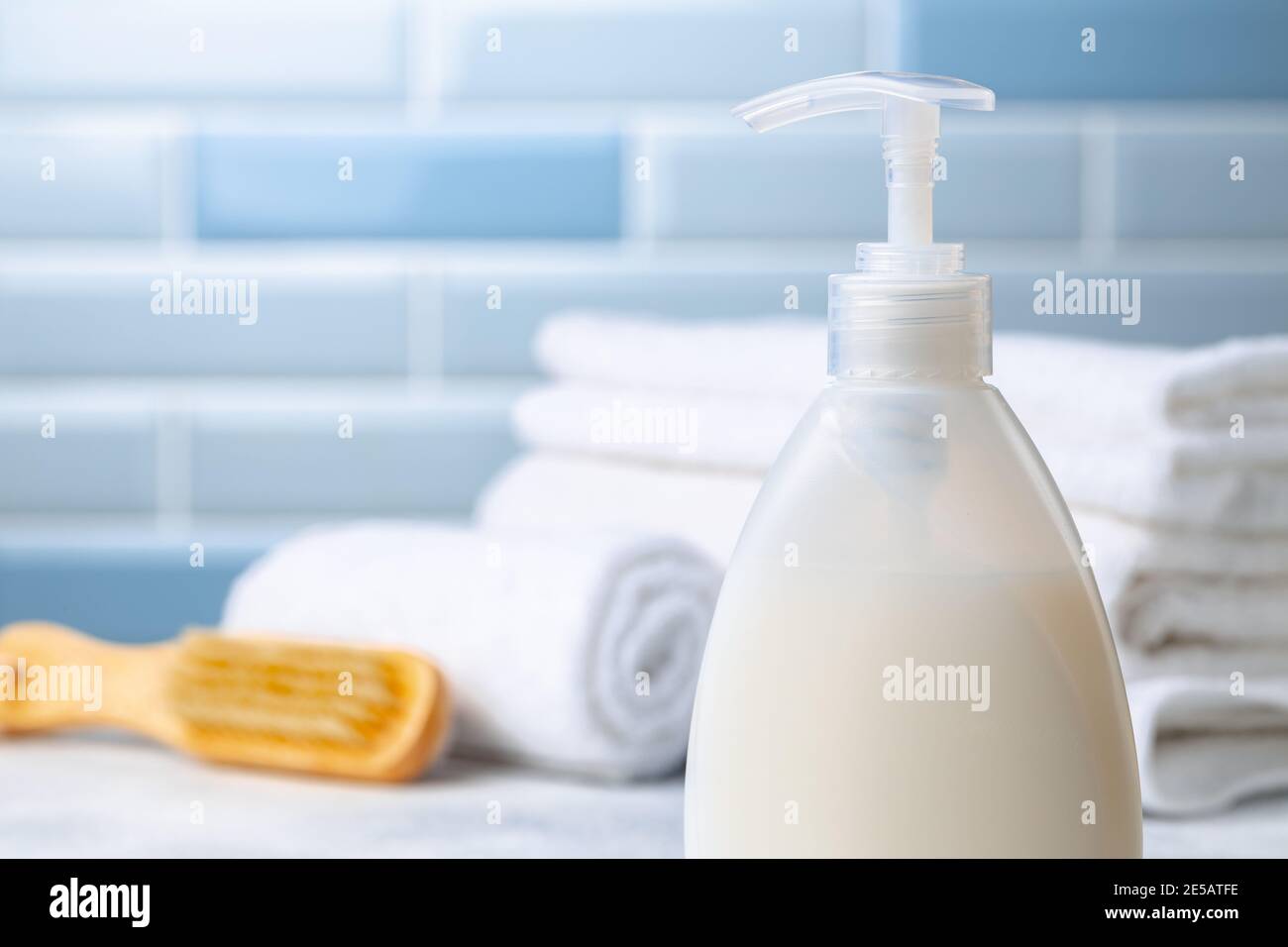 Liquid soap or body lotion set at hotel bathroom Stock Photo - Alamy