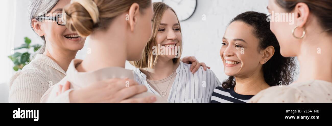 Team hugging hi-res stock photography and images - Alamy