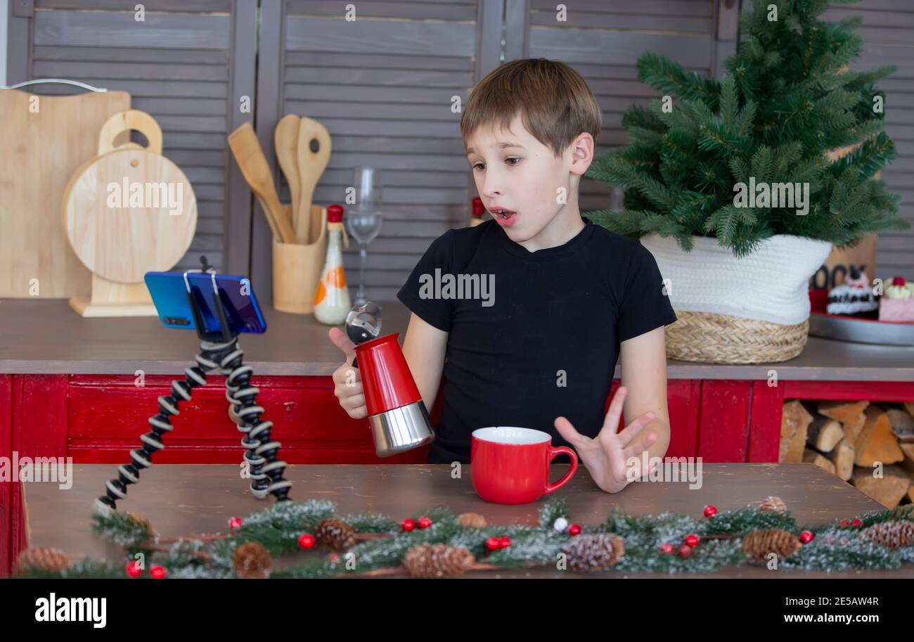 A portrait of a confident and creative child blogger talking to the ...