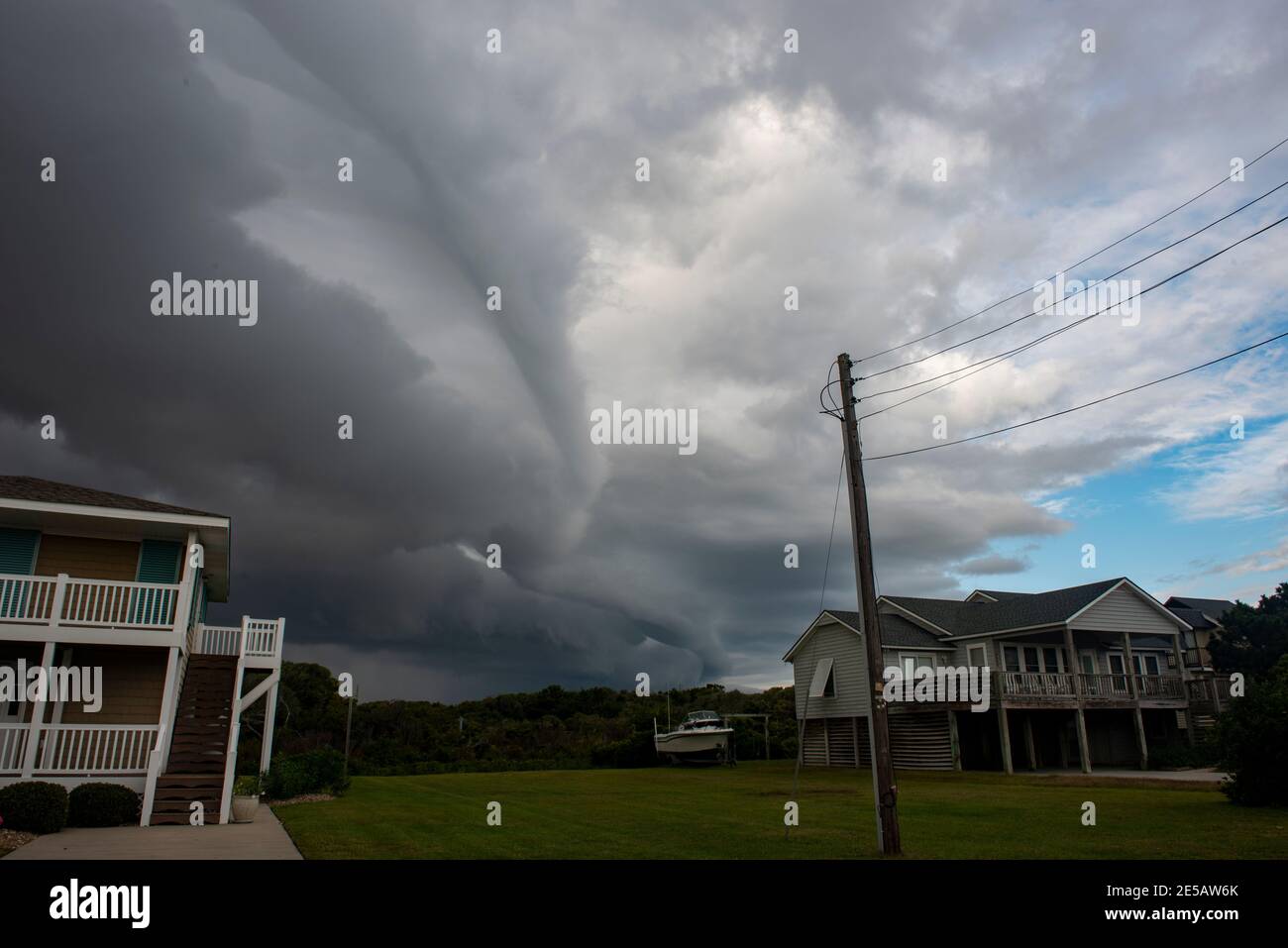 Tube Cloud Over House