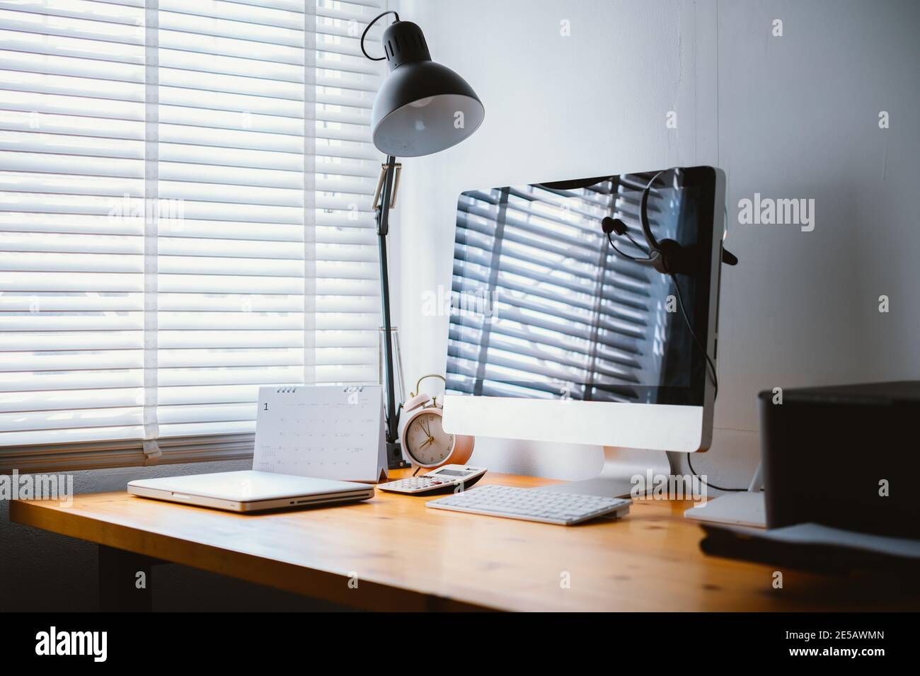 Comfortable workplace with computer on desk in home office Stock Photo ...