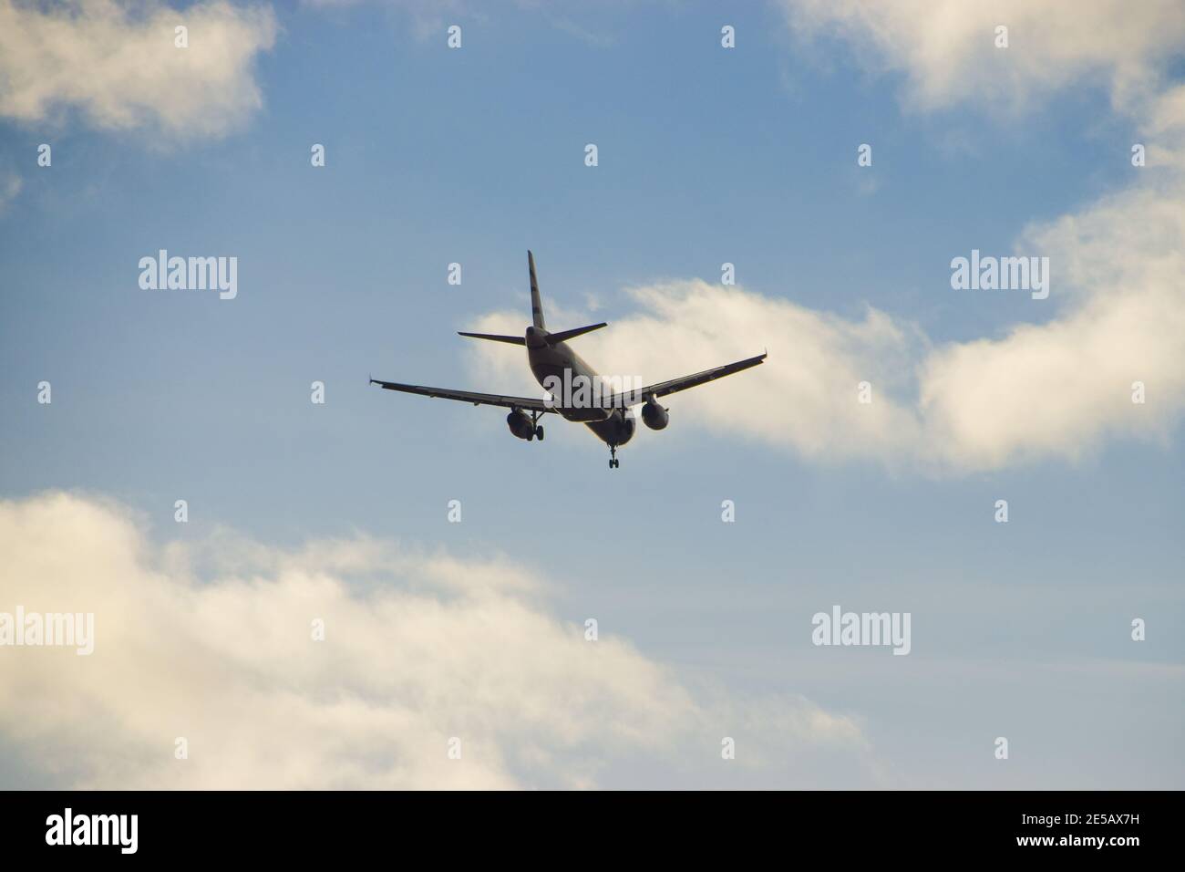 An airplane flying over Heathrow Airport, London Stock Photo - Alamy