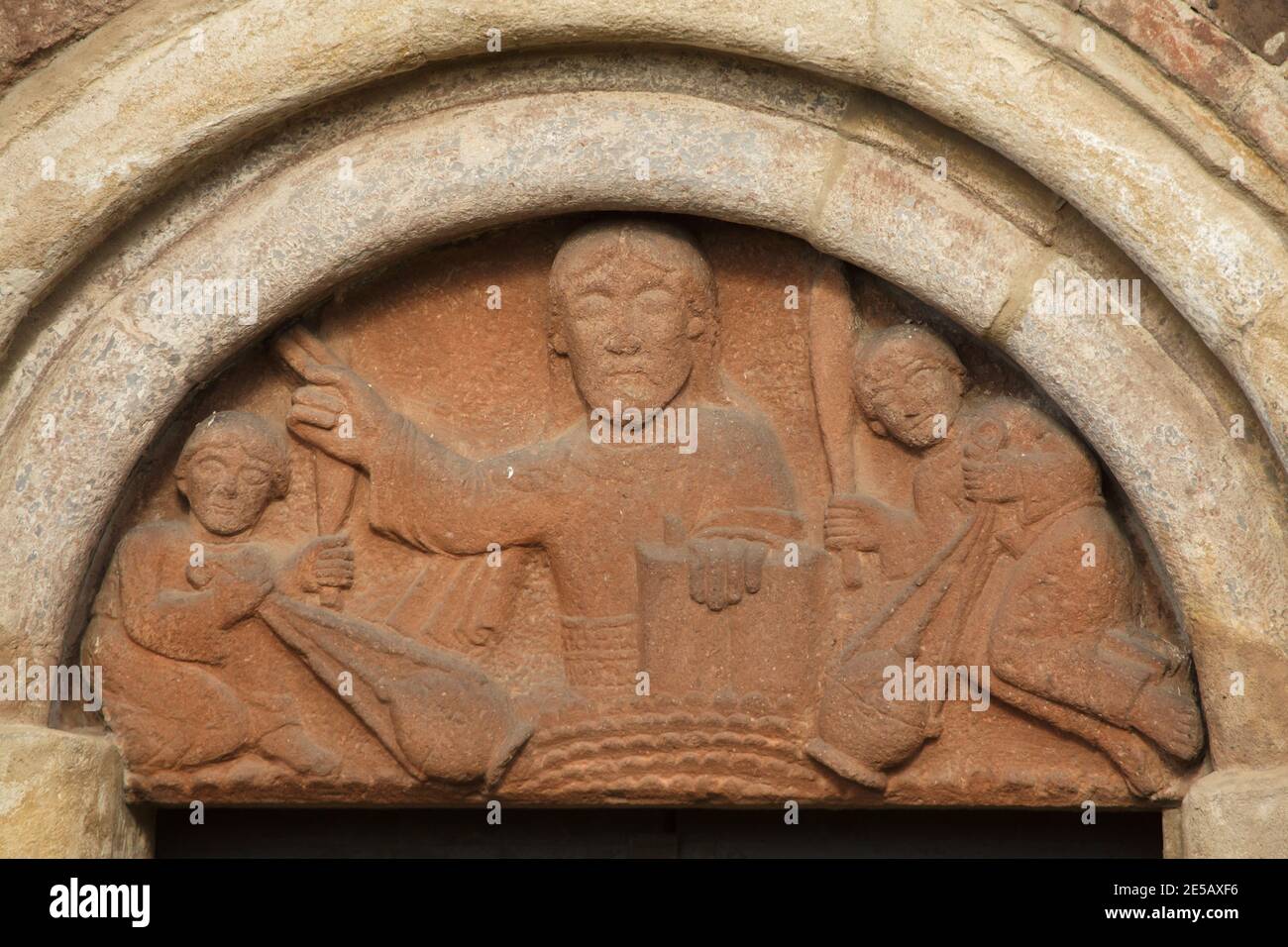 Jesus Christ surrounded with angels depicted in the Romanesque tympanum ...