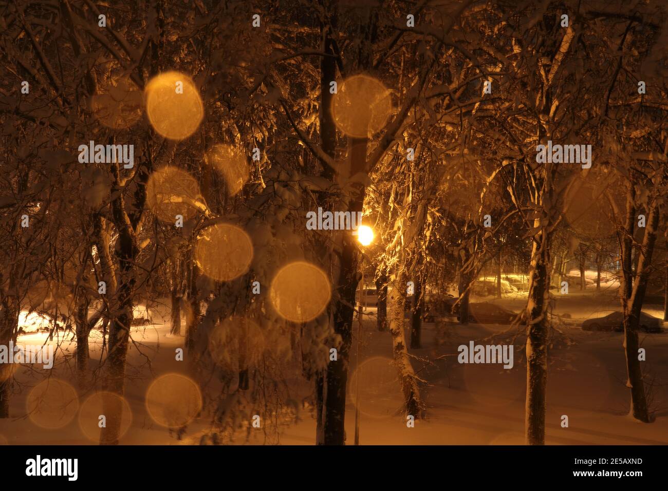 Winter in a town at night Stock Photo - Alamy