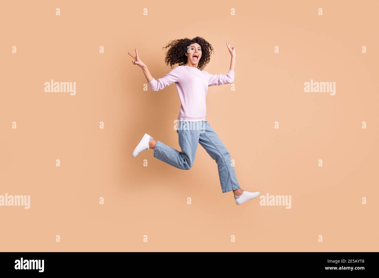 Full body portrait of excited crazy person jump run open mouth show v ...