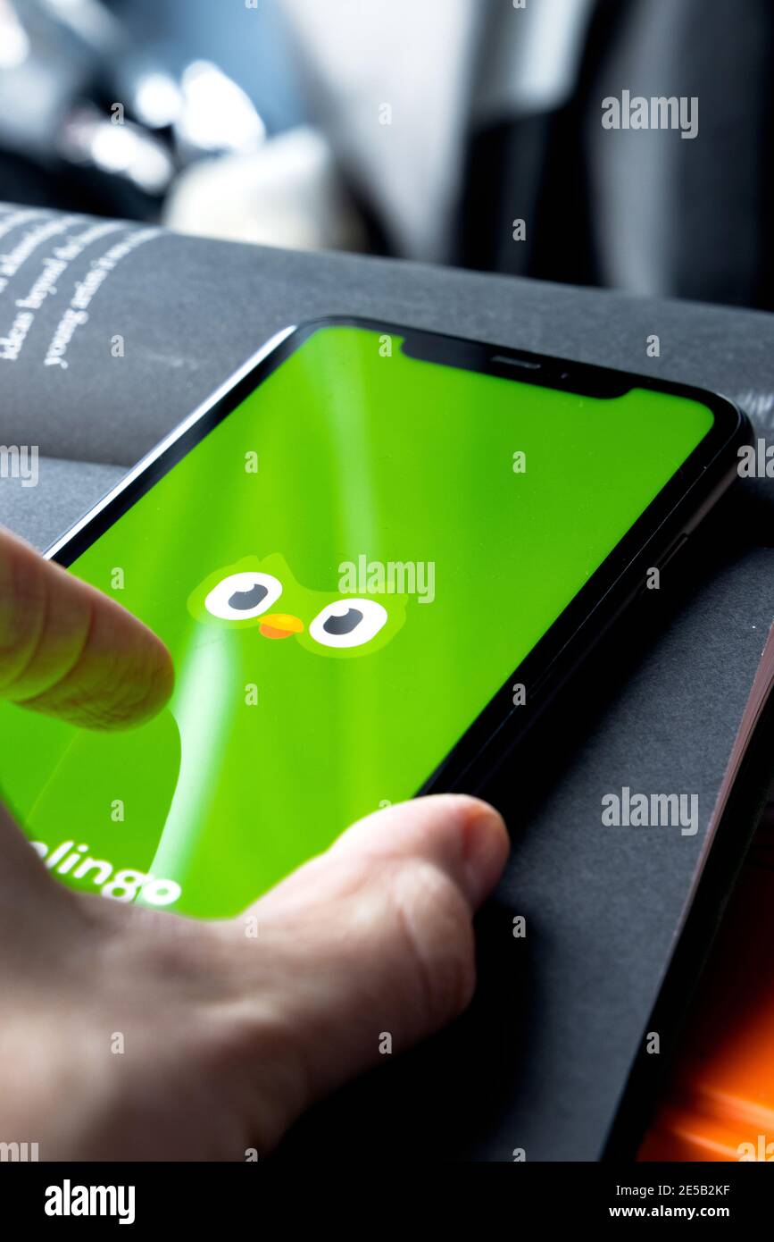 Duolingo app displayed on smart phone. Duolingo is an American language ...