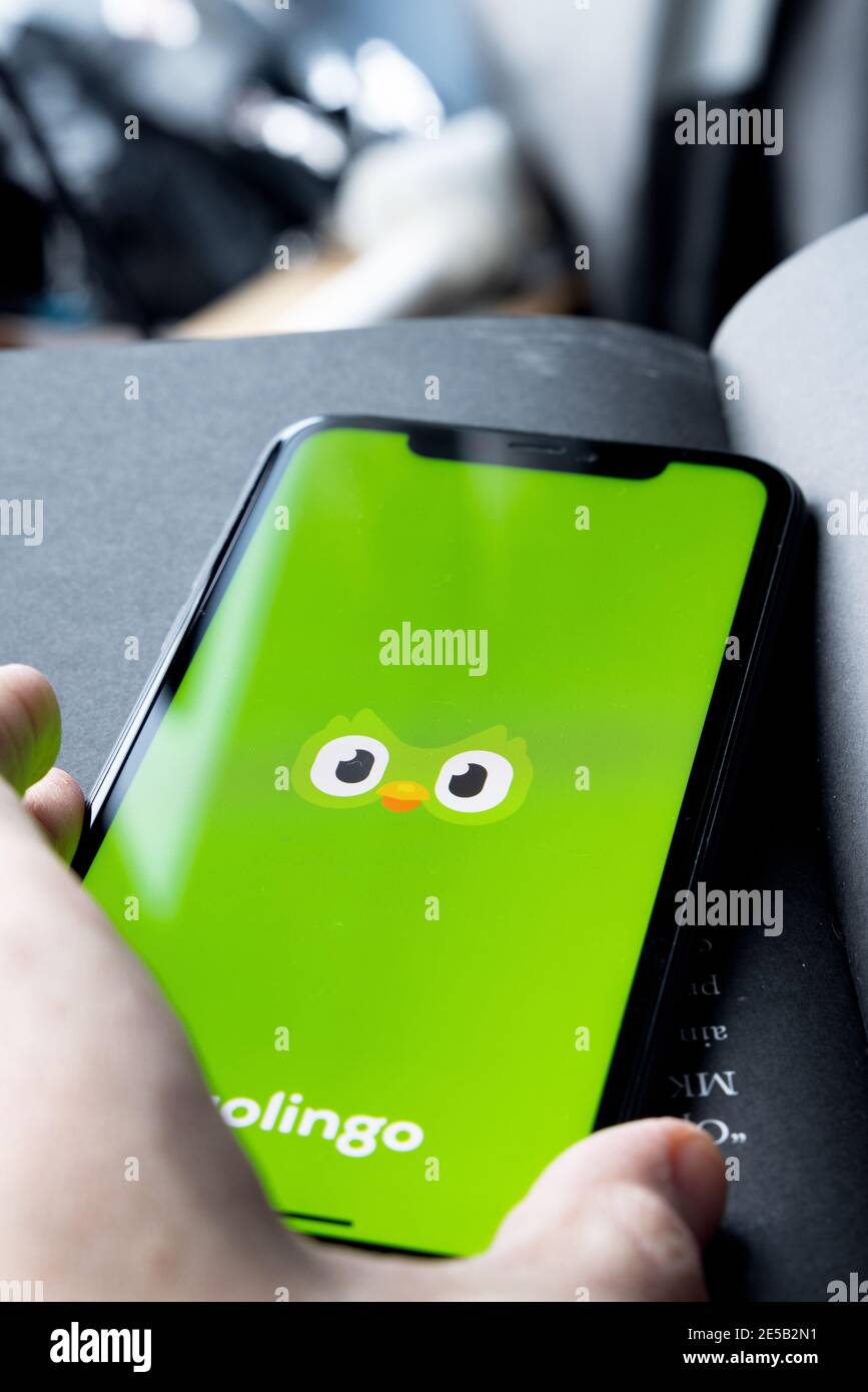 Duolingo app displayed on smart phone. Duolingo is an American language ...