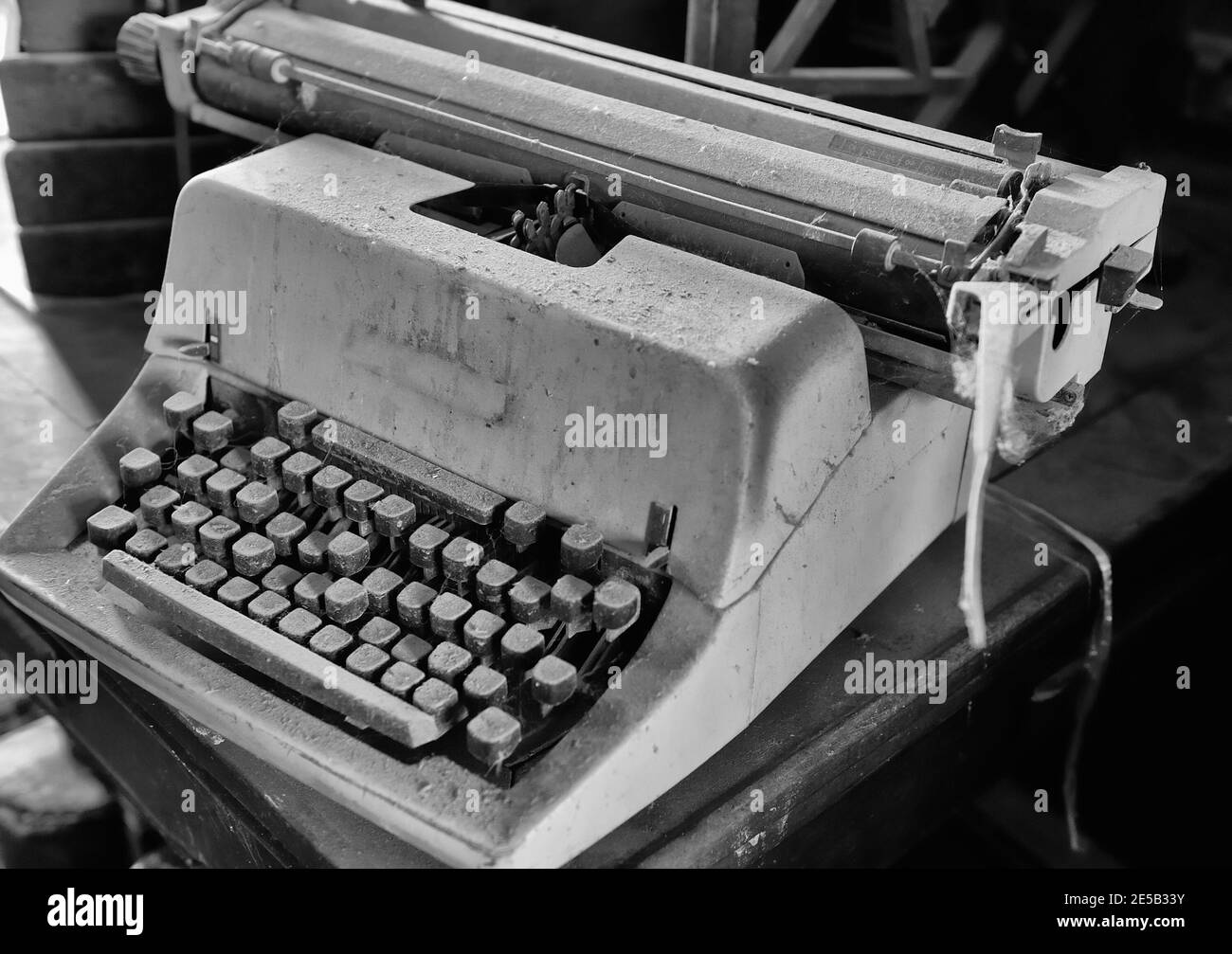 Abandoned, broken vintage typewriter machine covered by dust Stock ...