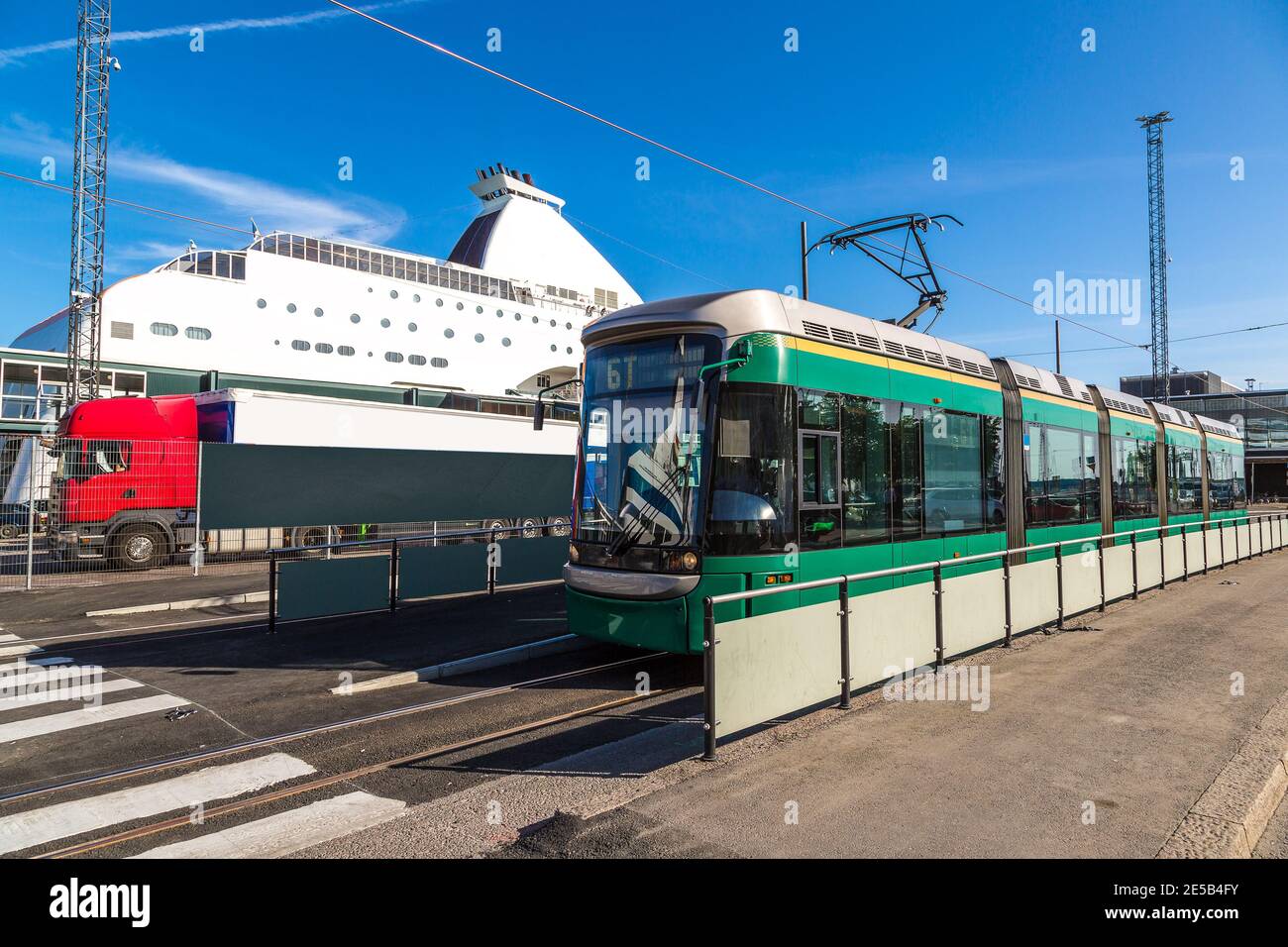 Public transport, modern tram in Helsinki port in a beautiful summer ...