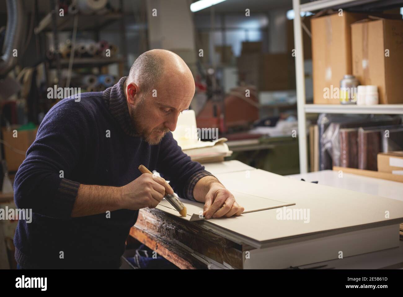 book binder stick a cover Stock Photo - Alamy