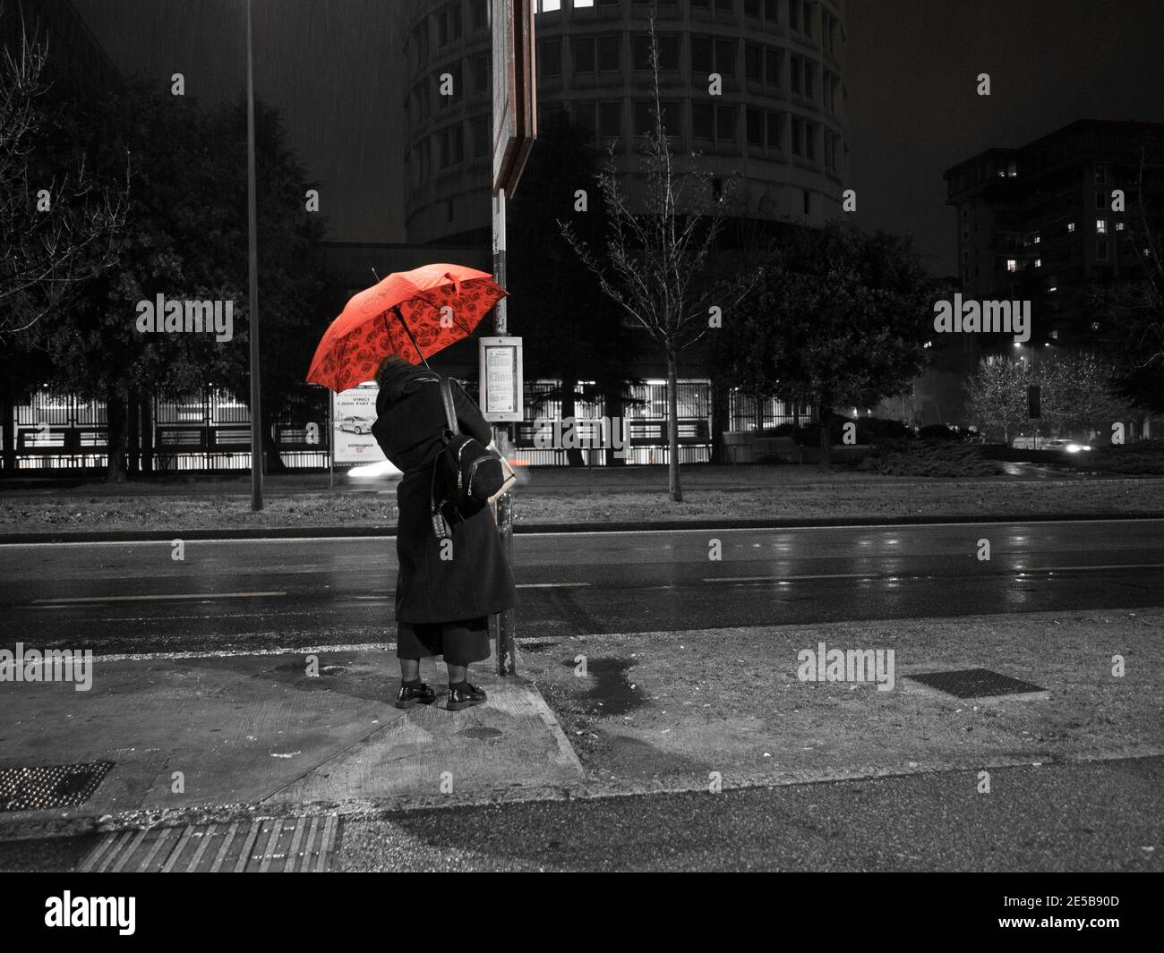 One person with an umbrella hi-res stock photography and images - Alamy